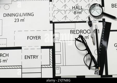 Pencil, dividers, ruler, glasses and magnifying glass on different ...