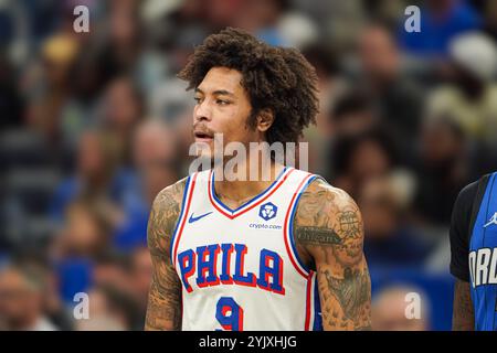 Philadelphia 76ers' Kelly Oubre Jr. (9) dunks the ball in front of ...