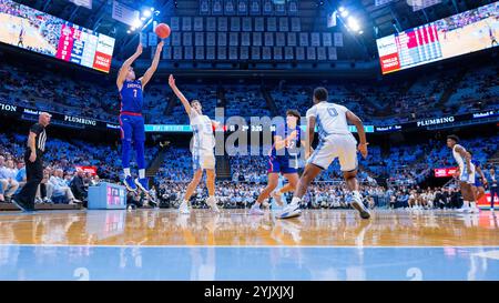 American University guard Wyatt Nausadis (7) speaks with head coach ...