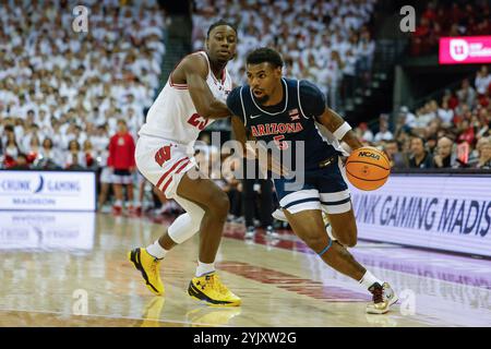 Arizona guard KJ Lewis (5) drives past Houston forward Joseph Tugler ...