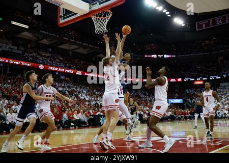 Arizona forward Tobe Awaka (30) attempts to shoot around Texas Tech ...