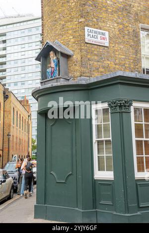statue, religious figure that gives name to the street,Catherine place ...