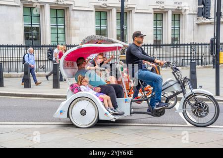 tuc tuc motor vehicle traveling in the central and tourist area of ...