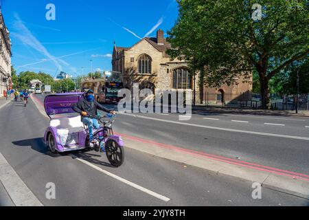 tuc tuc motor vehicle traveling in the central and tourist area of ...