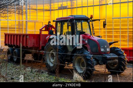 Tractor in greenhouse Stock Photo - Alamy