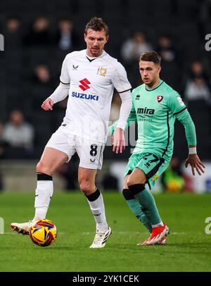 Milton Keynes Dons' Alex Gilbey during the Emirates FA Cup first round ...