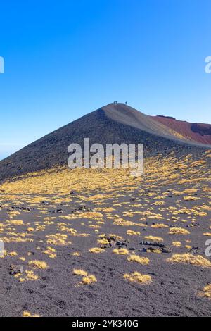 Group of hikers walking around crater rim, Etna, Sicily, Italy Stock ...
