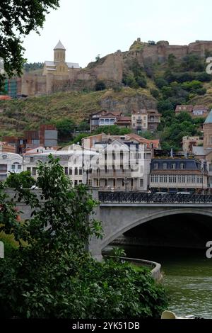 Tbilisi Old Town clings to the slopes above the Metekhi Bridge over the ...