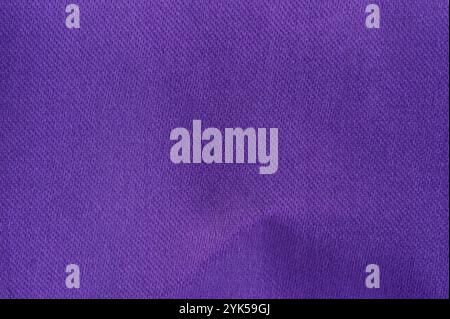Closeup detail of purple fabric texture background Stock Photo - Alamy
