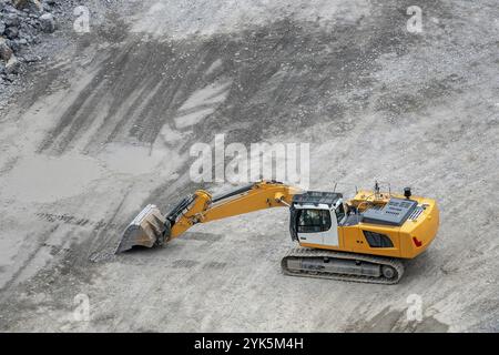 Mining industry quarry with working mining machines Stock Photo - Alamy