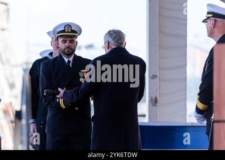 Retired Navy Captain Thomas Kelley about to present the long glass to ...