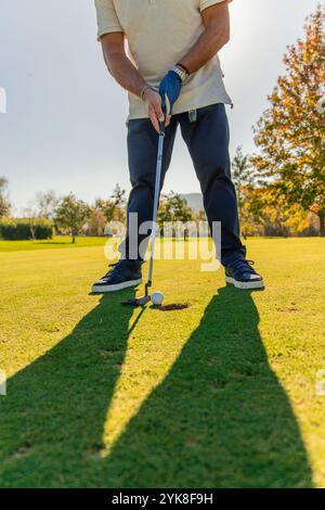 A vertical shot of a beautiful sunset on Shem creek with a cloudy sky ...