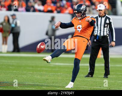 Denver Broncos punter Riley Dixon punts during the second half of an ...