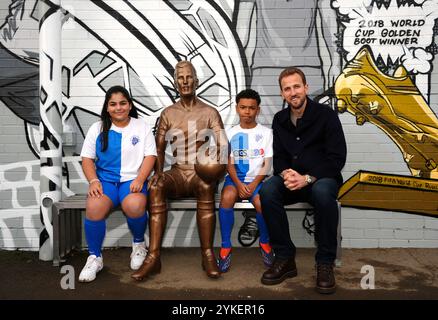 Harry Kane (right) following the unveiling of a statue of himself at ...
