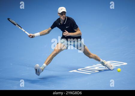 Jannik Sinner of Italy plays a forehand return to Alex de Minaur of Australia during their ...