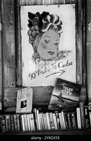 90 miles to Cuba poster featuring a hespanic girl wearing a fruit ...