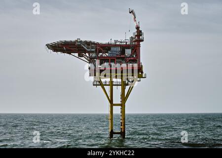 Unmanned offshore oil platform in the sea on a bright day Stock Photo ...