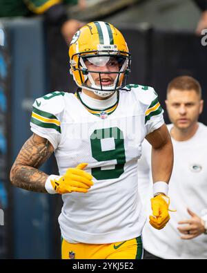 Green Bay Packers' Christian Watson runs in for a touchdown against the ...