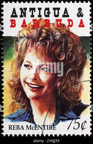 Country music singer Reba McEntire makes her entrance onstage during a ...