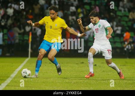 FRANCEVILLE, GABON - NOVEMBER 15: Anthony Oyono of Gabon and Abdessamad ...