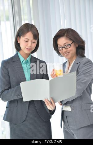 Boss and subordinate Stock Photo - Alamy