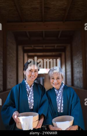 Mother and daughter in yukata and haori at a hot spring Stock Photo - Alamy