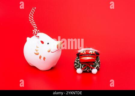Wild boar and lion dance figure Stock Photo - Alamy