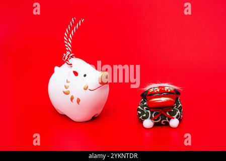 Wild boar and lion dance figure Stock Photo - Alamy