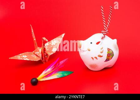 Wild boar figure and feather,Origami crane Stock Photo - Alamy
