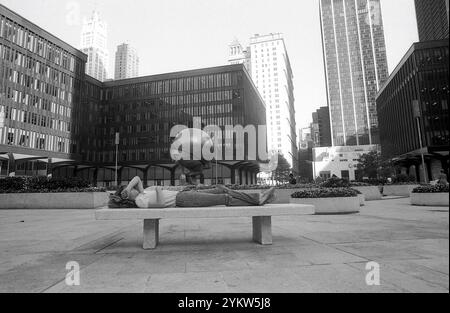 Manhattan, 1982. Man resting in the World Trade Center Plaza. The ...