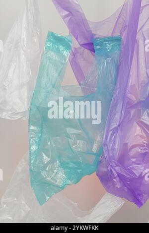 Vertical shot of various colorful plastic bags. New multicolored ...