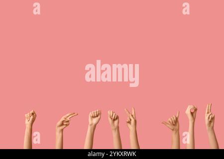 Female hands showing phrase Thank You on yellow background. Sign ...