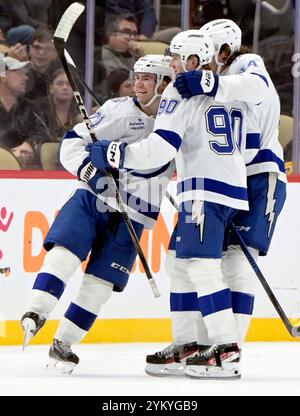 Tampa Bay Lightning center Conor Geekie (14) celebrates with the bench ...