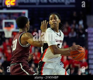 Georgia guard Silas Demary Jr. (5) holds on to the ball against ...