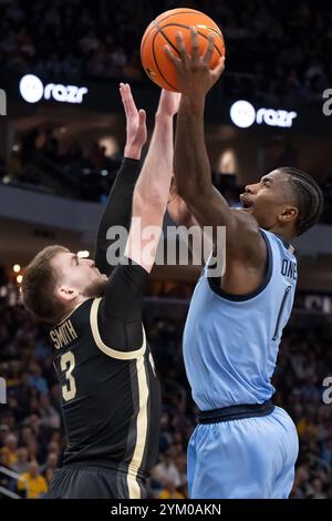 Purdue guard Braden Smith (3) shoots a three pointer as Auburn center ...