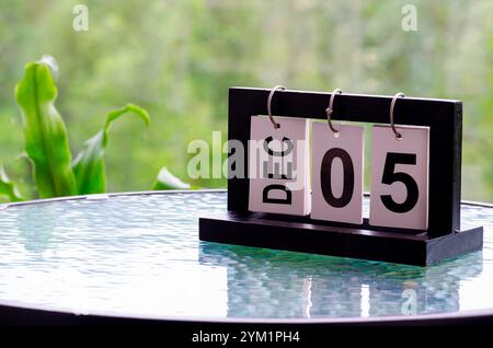 7 December calendar on marble table with customizable space for text ...