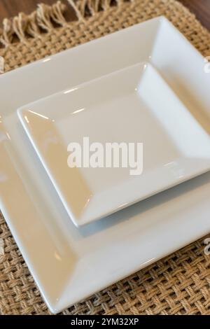 Brown empty dinner plate setting on wooden table Stock Photo - Alamy