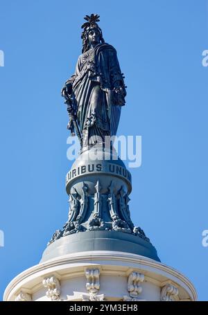Statue of Freedom crowns the Capitol dome, facing east. It is cast ...