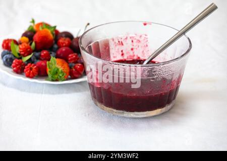 Traditional artisanal jam made from organic red fruits. Creative food ...
