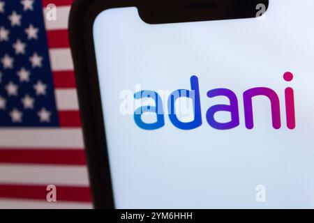 Adani company logo with US flag in the background, symbolizing Adani ...