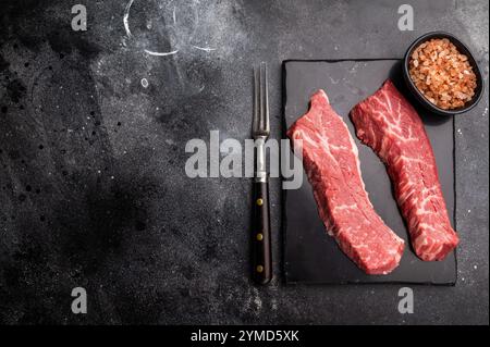 Raw Tri Tip Steak from Black Angus beef meat with rosemary. wooden ...