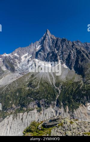 Petit Dru granite mountain wall and summit in Chamonix valley, french ...