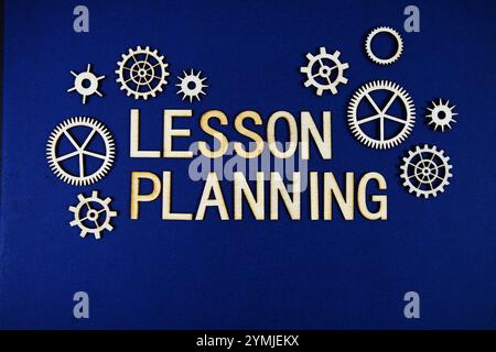 Lesson Planning alphabet letters with gears element on navy blue ...