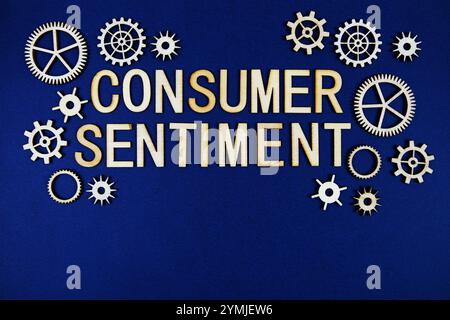 Consumer Sentiment alphabet letters with gears element on navy blue ...