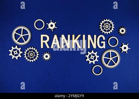 SEO Ranking alphabet letters with gears element on navy blue background ...