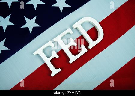 The Federal Reserve (FED) alphabet letters with USA flag background ...