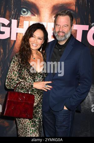 Paul Debevec (L) and Tia Carrere attend the world premiere of The ...