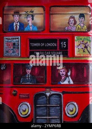 Colorful red double-decker bus moves quickly through motion blur effect ...