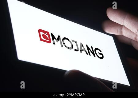 Mojang logo is displayed on smartphone. Mojang Studios is a Swedish ...