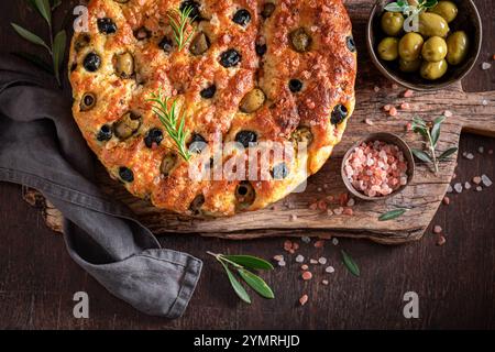 Traditional focaccia with different types of olives. Traditional ...